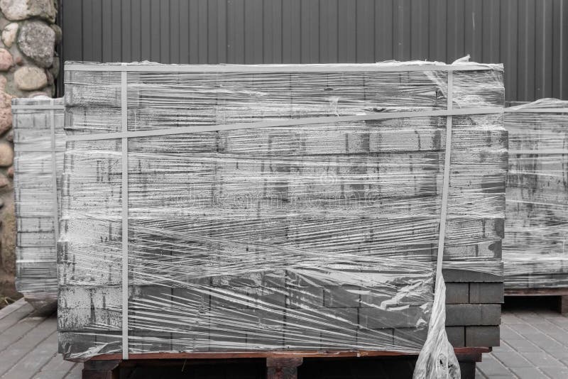 Stone Pavement Blocks in a Pile of Tiles Building Material Packed in ...