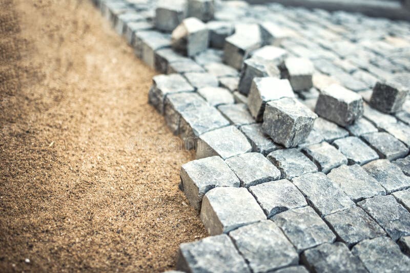 Stone Pavement, Construction Worker Laying Cobblestone Rocks on Sand ...