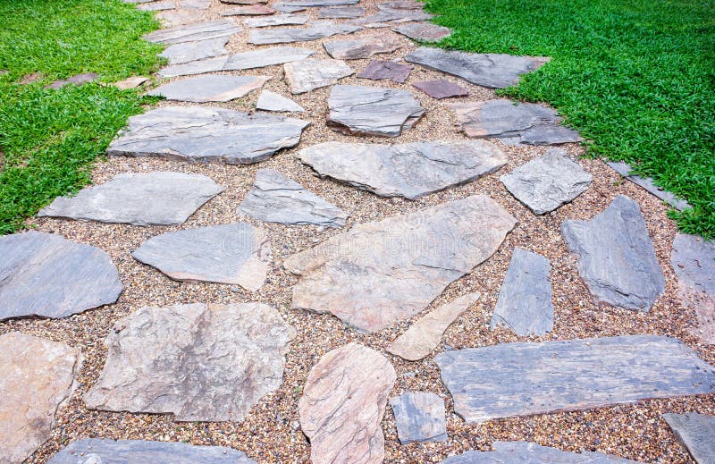 Stone Pavement with Grass Lawn beside Stock Photo - Image of ...