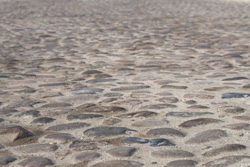 Stone pavement road stock image. Image of cobble, alley - 143209611