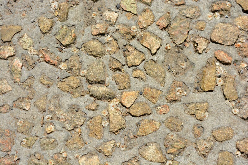 Beautiful and Unusual Light Brown Stones Filled with Gray Cement and ...