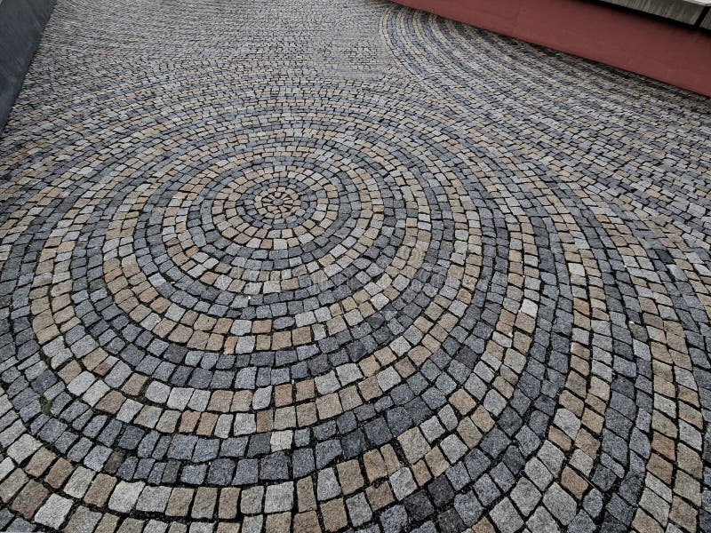 Stone Paving in the Square Folded into Stock Photo - Image of rings ...
