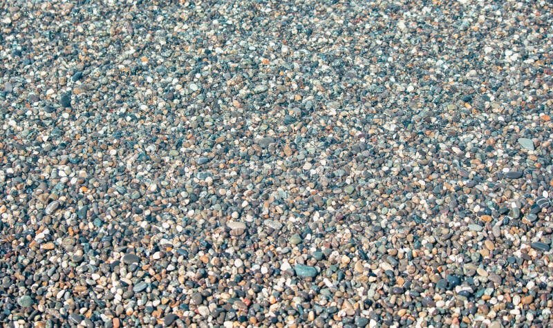 Stone Pebbles on the Shore As an Abstract Background. Texture. Stock ...