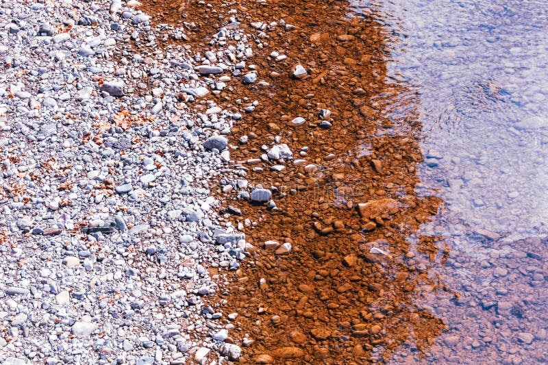 Stone Pebbles on the Shore As an Abstract Background. Texture. Stock ...