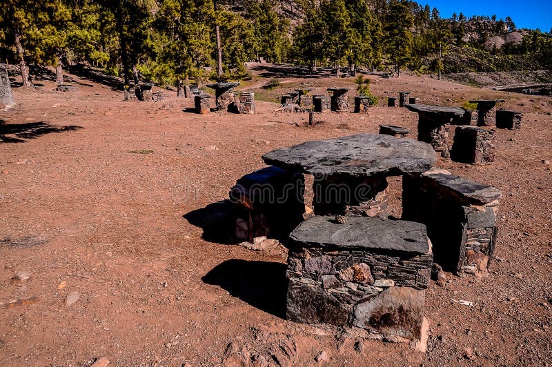 A Stone Picnic Table Sits in a Field of Dirt Stock Image - Image of ...