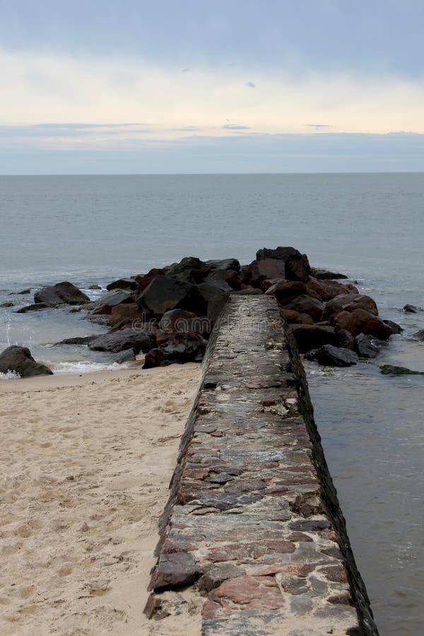 Stone pier stock photo. Image of beach, skyline, seaskape - 70625562