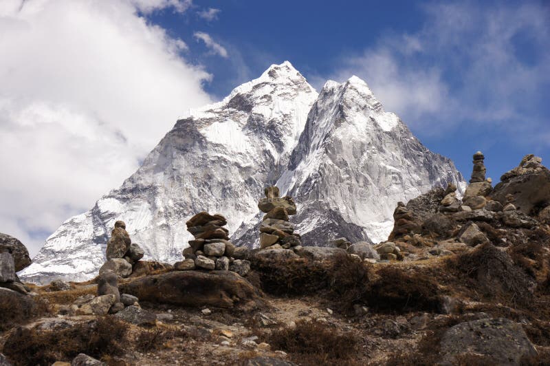 Stone Piles and Great Mountains Stock Photo - Image of himalayan ...