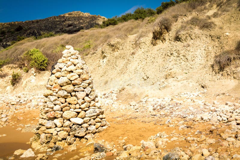 Stone Pyramid on the Beach, Malta Stock Photo - Image of pebble, beach ...