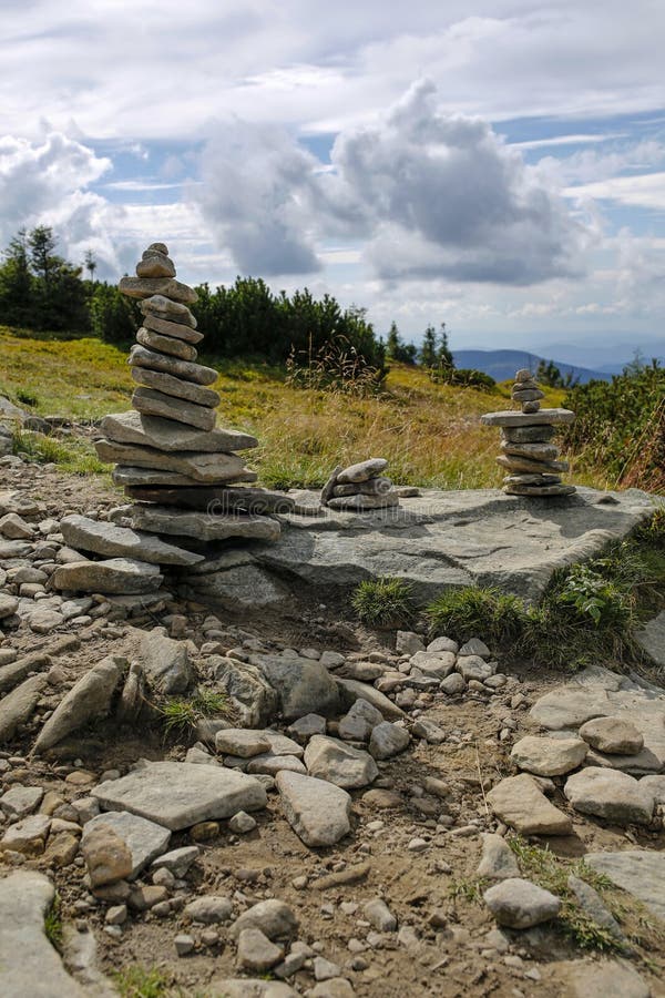 Stone Pyramid in the Mountains Stock Image - Image of stack, cloud ...