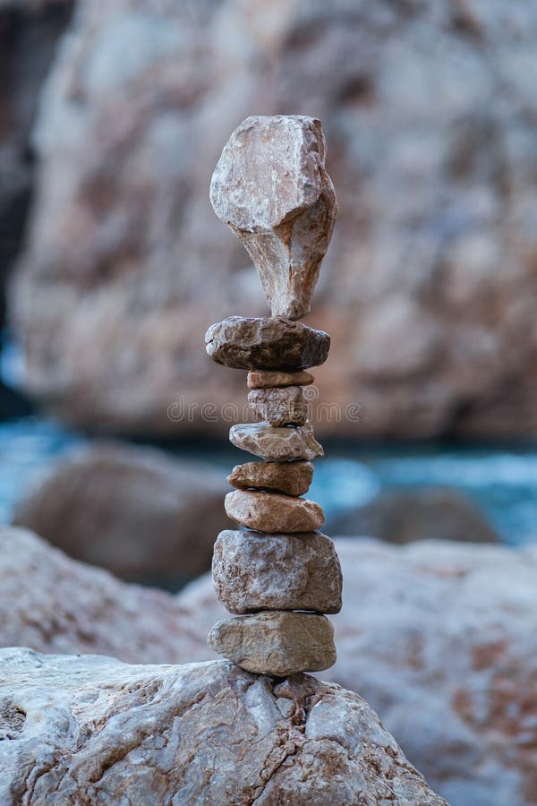 Stone Pyramids on the Beach Stock Photo - Image of smooth, background ...