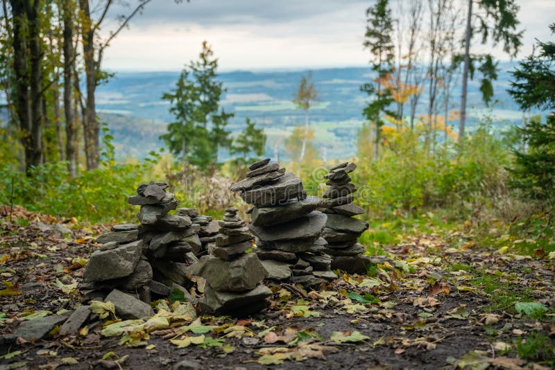 Stone Pyramids Lined Up Along the Trail Stock Photo - Image of tree ...