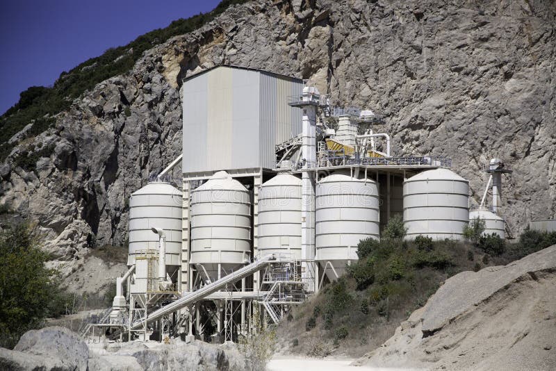 Stone quarry factory stock photo. Image of machinery - 191718318