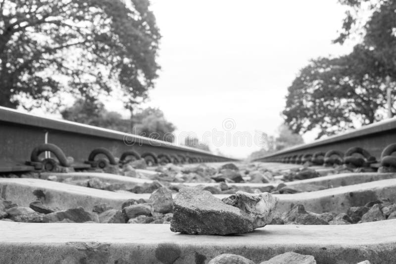 Stone on the Rail Way on the Morning with Copy Space Stock Photo ...