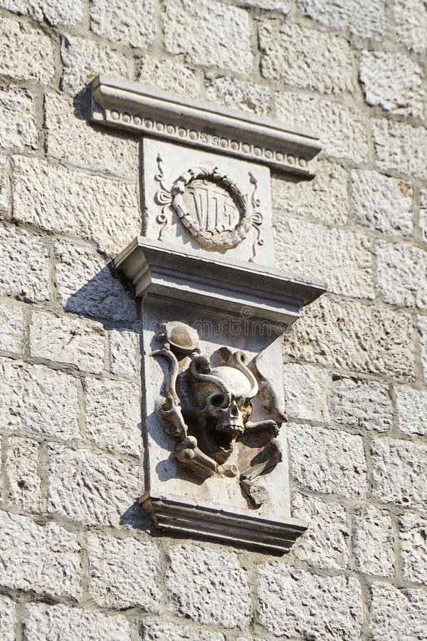 Stone Relief on the Wall with the Image of a Skull, a Turtle, a Stock ...