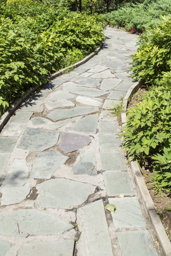 Stone road in the garden stock image. Image of cobbles - 41444467