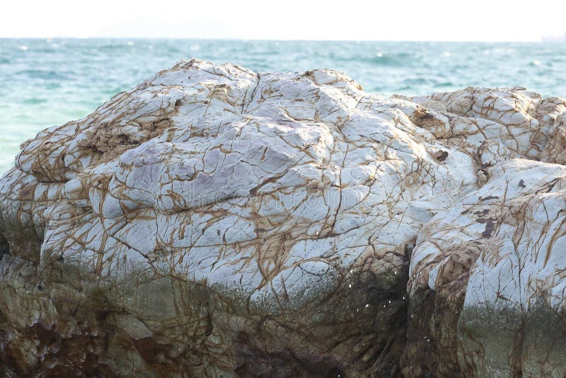 Stone or Rock Above or Below the Surface of the Sea. Stock Image ...