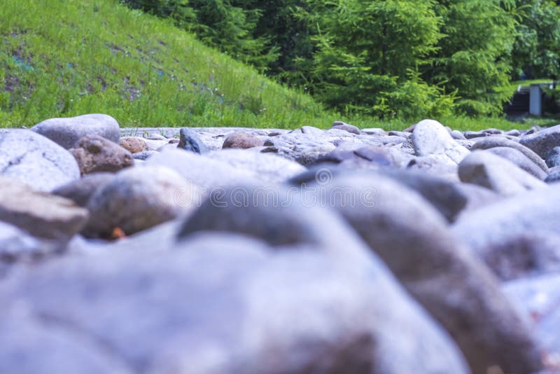 Stone rock on a green hill stock image. Image of landscape - 152550499