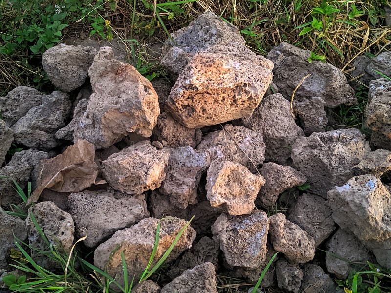 Stone Rock Material and Grass Stock Image - Image of building, heap ...