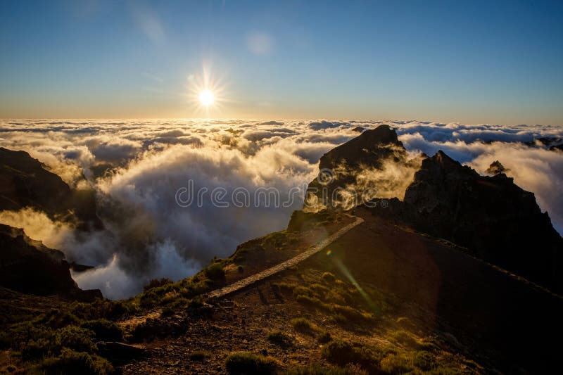 The Stone Rocks, Peaks of Mountains. Clouds and Sunset Light Background ...