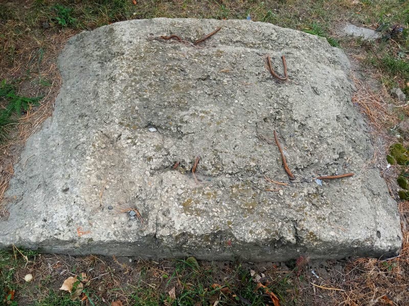 Stone with rusty iron stock image. Image of cemetery - 197698993
