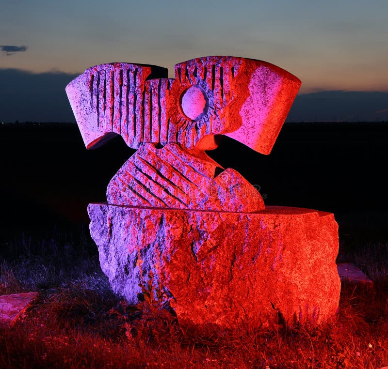 Stone Sculpture in Colored Light Editorial Photography - Image of ...