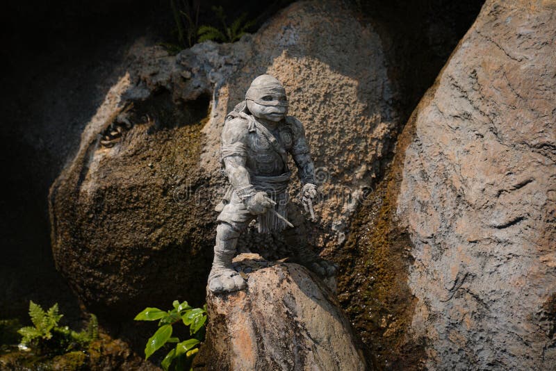 Stone Sculptures of Ninja Turtle at the Waterfall Stock Image - Image ...