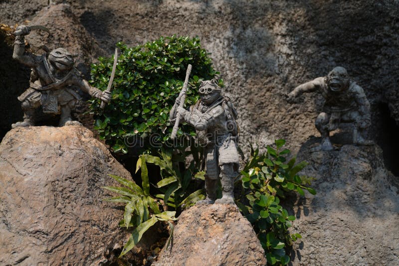 Stone Sculptures of Ninja Turtles at the Waterfall Stock Photo - Image ...