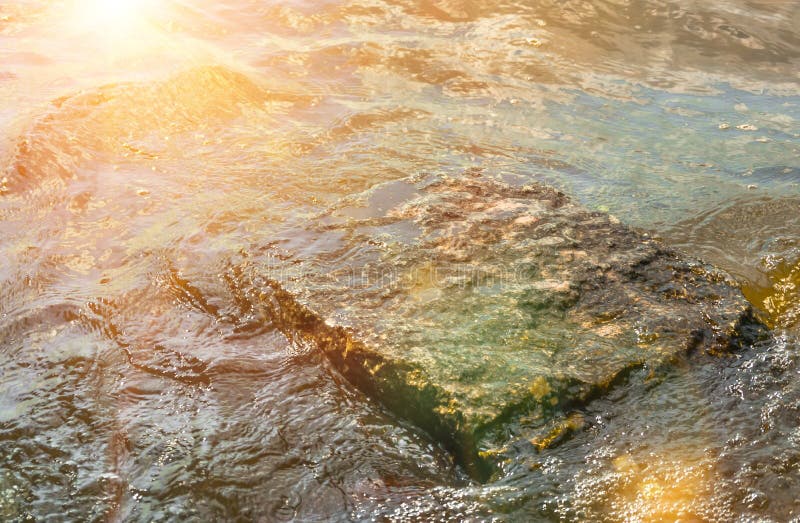 Stone in sea water stock image. Image of stream, rock - 76247001