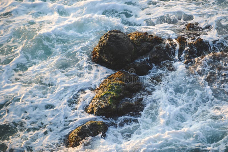 Stone in Sea Waves stock image. Image of summer, clear - 69770553