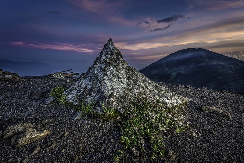 Stone in a Shape of a Mountain in Sunrise Light Stock Photo - Image of ...