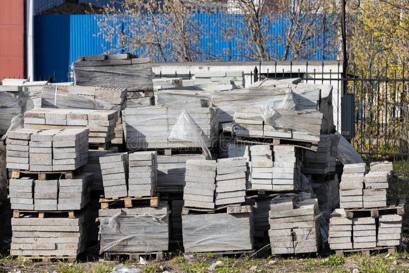A Stone Slab Folded into Briquettes Lies in the Yard Stock Photo ...