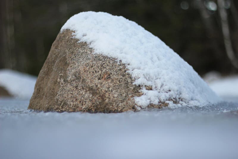 Stone with snow stock photo. Image of stone, winter - 144523938