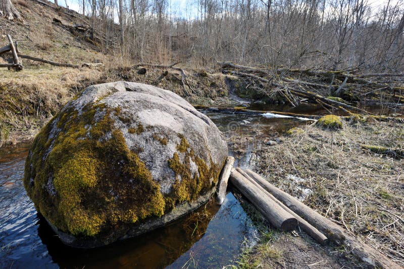 Stone in Spring Water. Clean Water Flow among Large Stone Stock Image ...