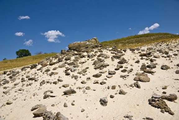 Stone sprinkle on the sand stock image. Image of clouds - 15620203