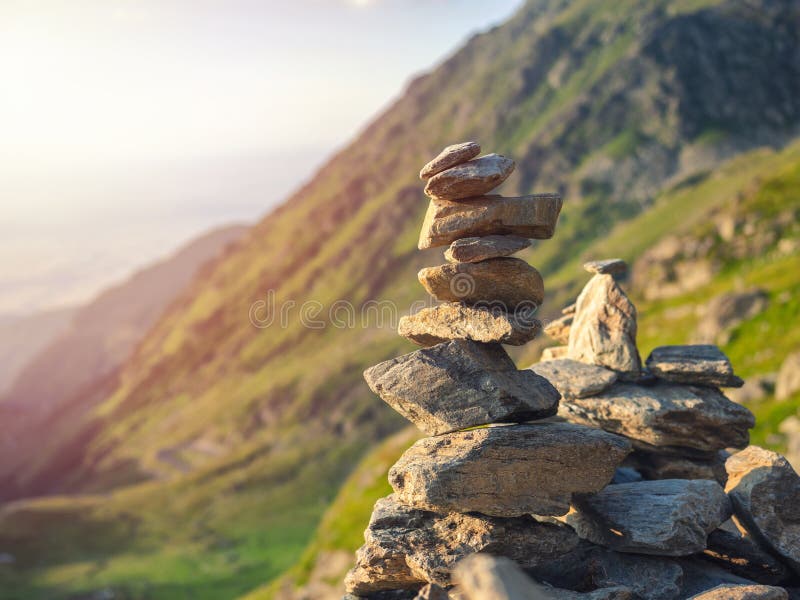 Stone Stack with Balanced Stones on Blurred Mountain Background in ...