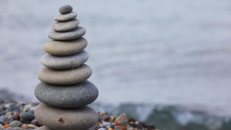 Stone Stack on Pebble Beach, Sea in Background, Stock Footage - Video ...