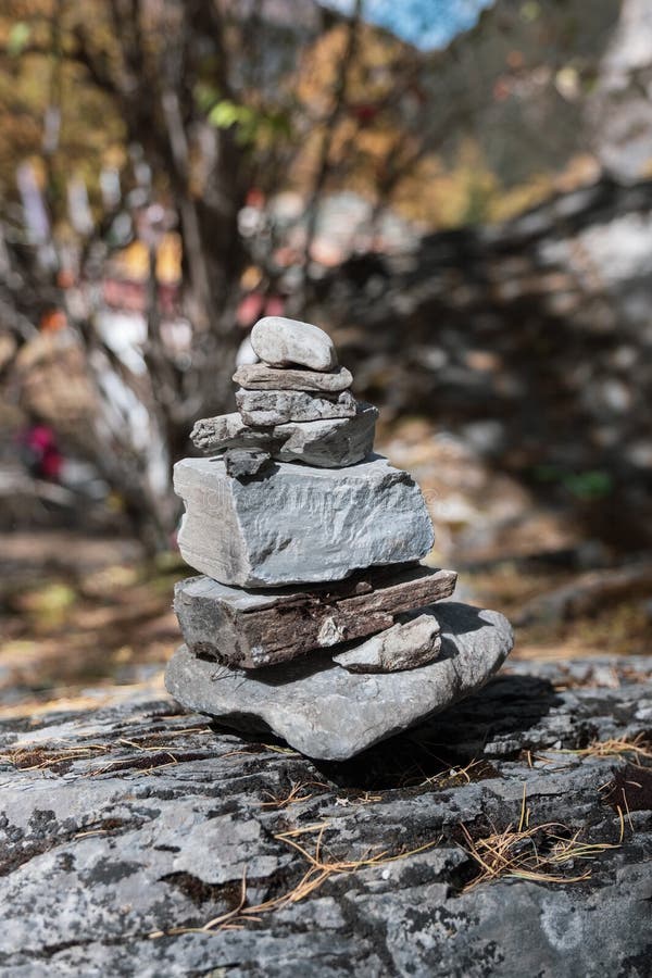 Stone Stacked on Rock in Forest Stock Photo - Image of pine, balance ...