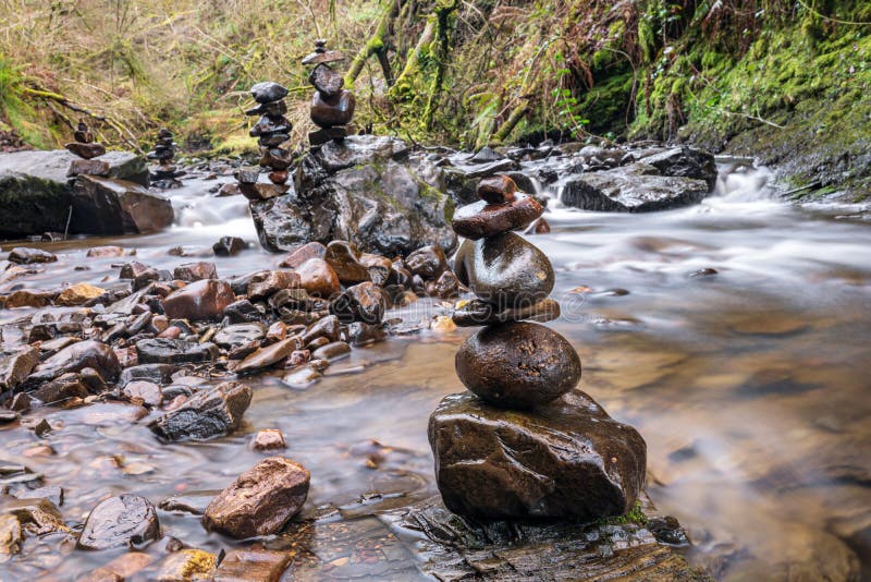 Stones stacks at river stock photo. Image of ecosystem - 239393808
