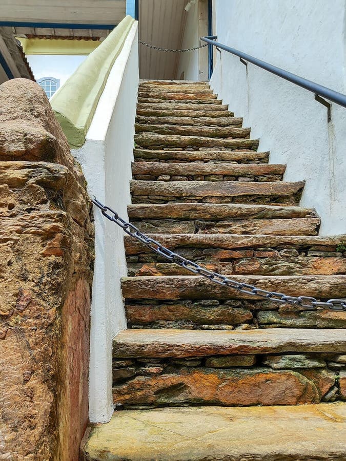 Stone staircase with chain stock photo. Image of path - 340566360