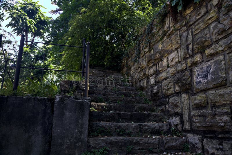 Stone Staircase Made in a Stone Wall Stock Photo - Image of park ...