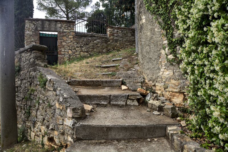 Gate in a Stone Wall at the End of a Path Stock Image - Image of glow ...