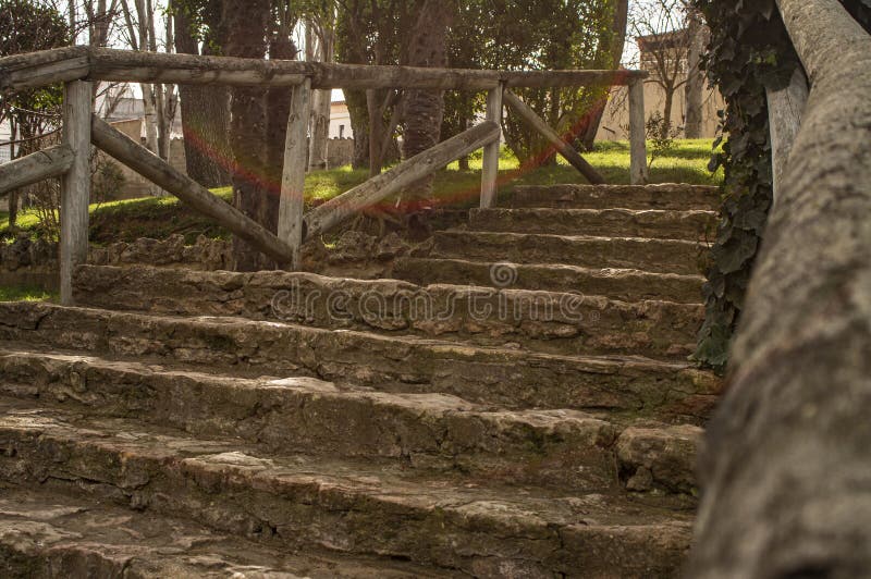 Stone Staircase and Wooden Railing Stock Image - Image of massive, wall ...