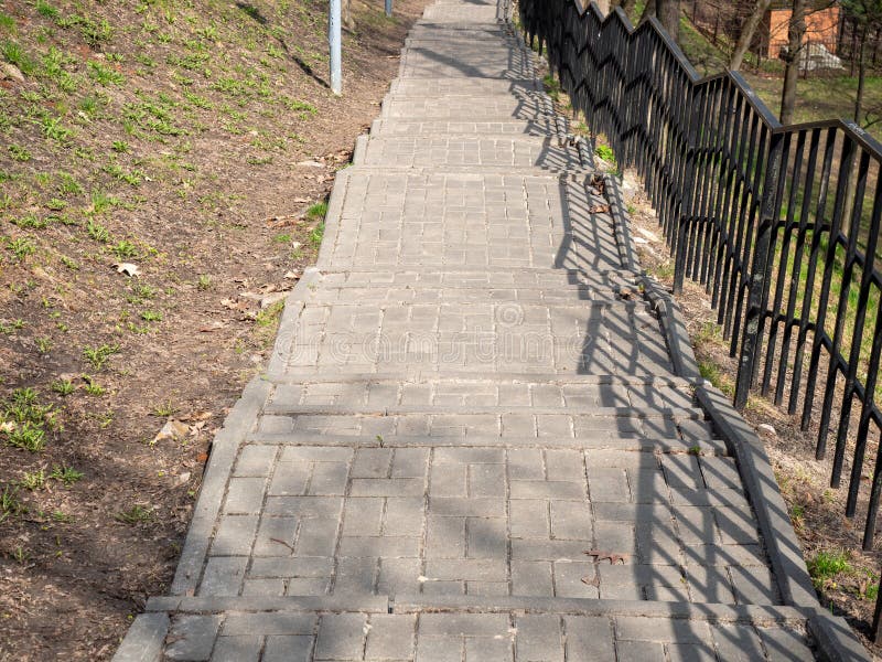 Stone Stairs in the Park with Shadow of Fence on the Ground Stock Photo ...