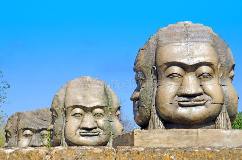 Stone statue head carving stock photo. Image of mythology - 30812252