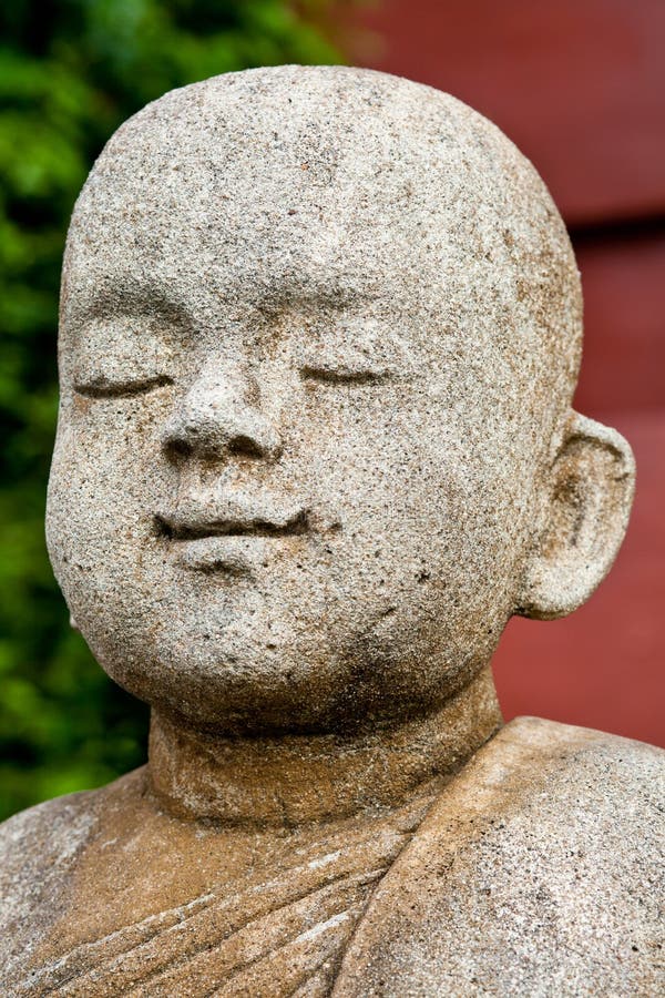 Stone statue of a novice. stock image. Image of religious - 21848653