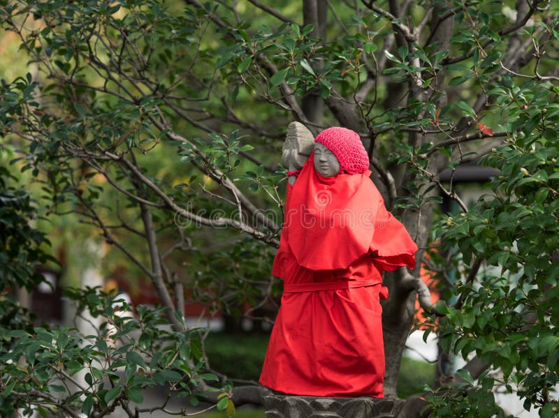 Stone Statue in Red Clothes, Tokyo, Japan. Stock Image - Image of ...