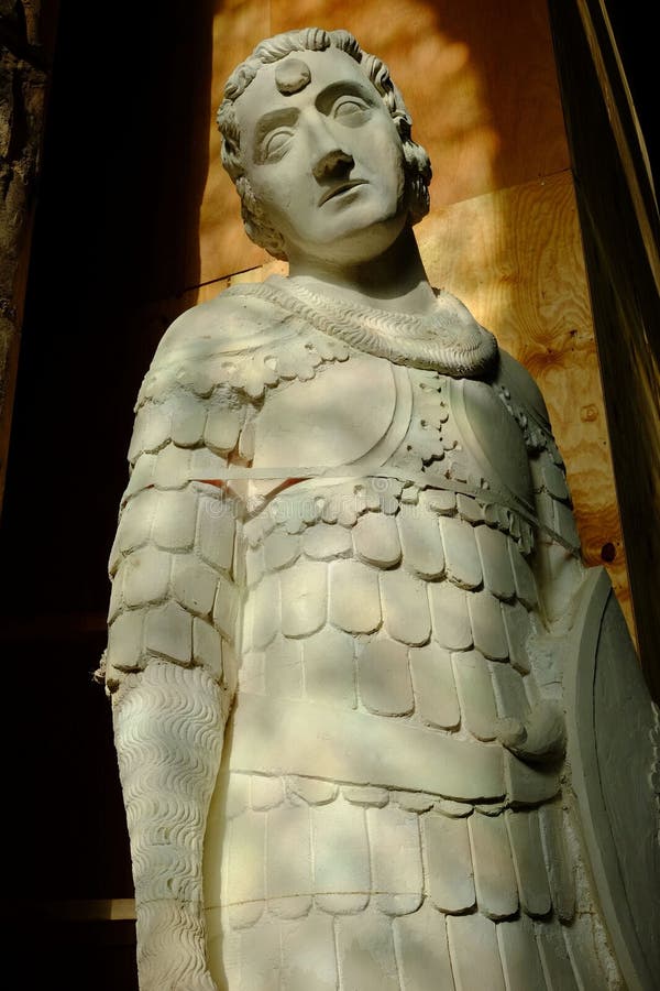 Stone Statue of a Soldier in an Armor and a Shield in His Hand Stock ...