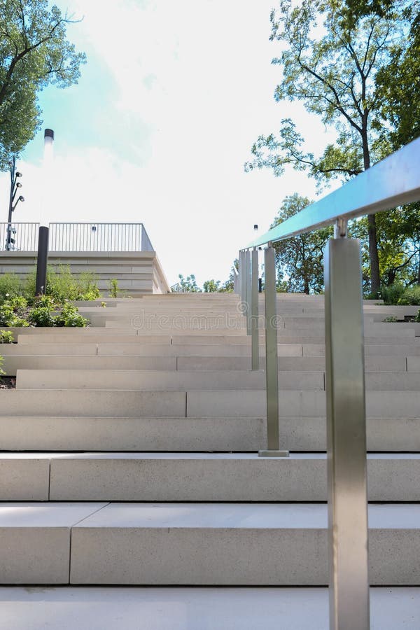 Stone Stairs with a Chrome Railing Stock Photo - Image of metal ...