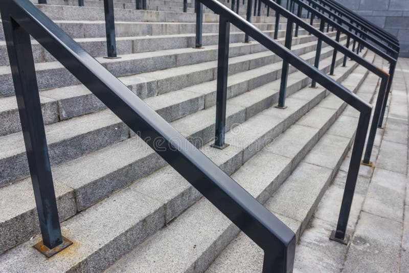 Stone steps with railing stock photo. Image of angle - 52422406
