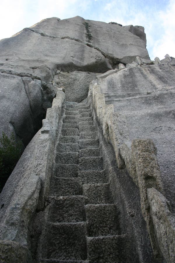Stone steps on rock cliff stock photo. Image of carved - 4321204
